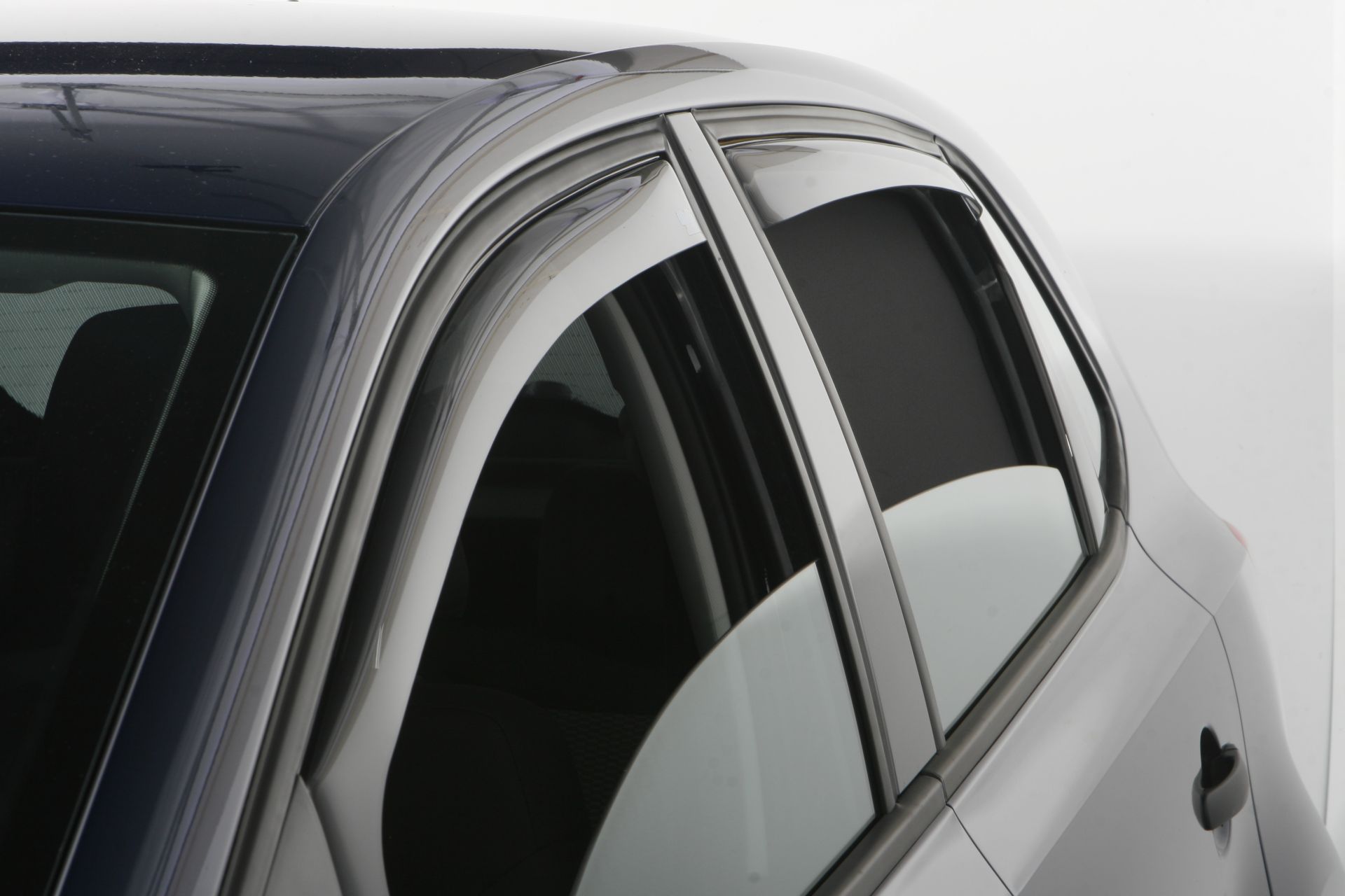 The wind deflectors, made of high-quality cast acrylic glass, are ...